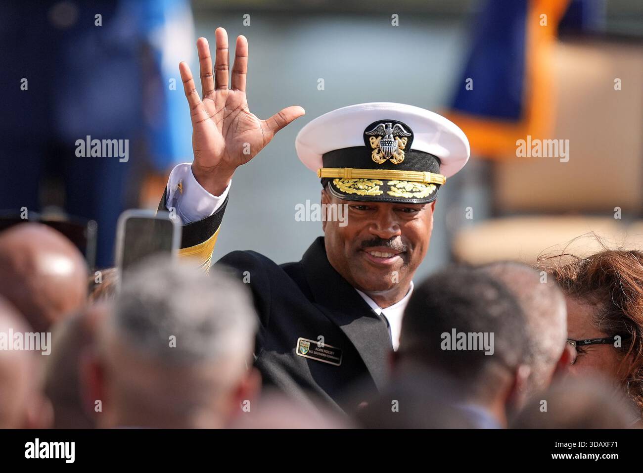 Navy Adm. Alvin Holsey waves at the end of his relinquishment of ...