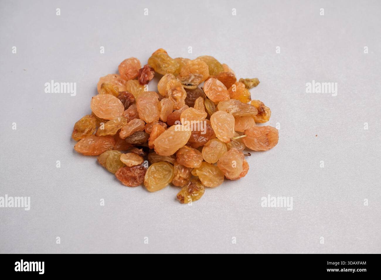 Macro Still Life of Healthy Golden Raisins (Vitis vinifera) Displaying ...