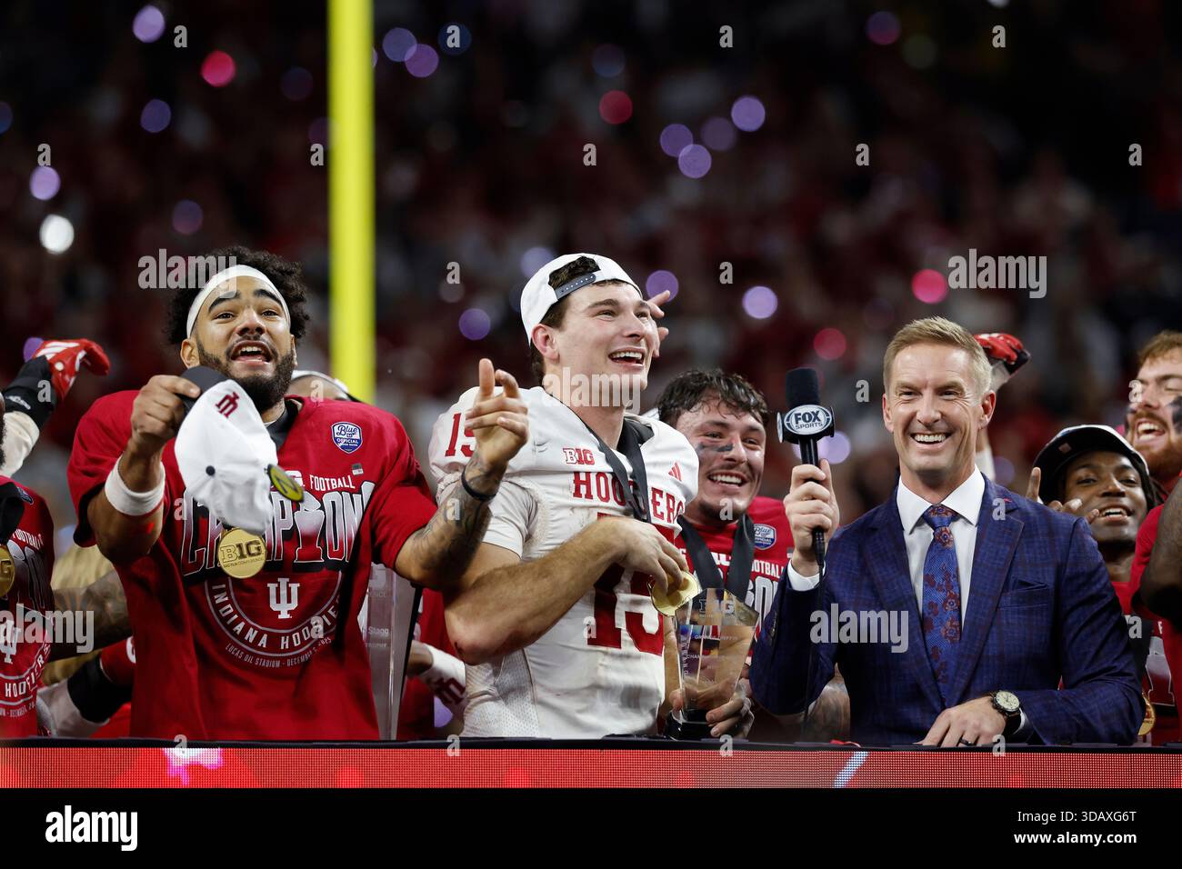 INDIANAPOLIS, IN - DECEMBER 06: Fernando Mendoza #15 and Elijah Sarratt ...