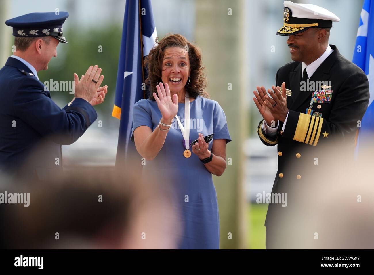Navy Adm. Alvin Holsey, right, as his wife Stephanie Holsey is ...