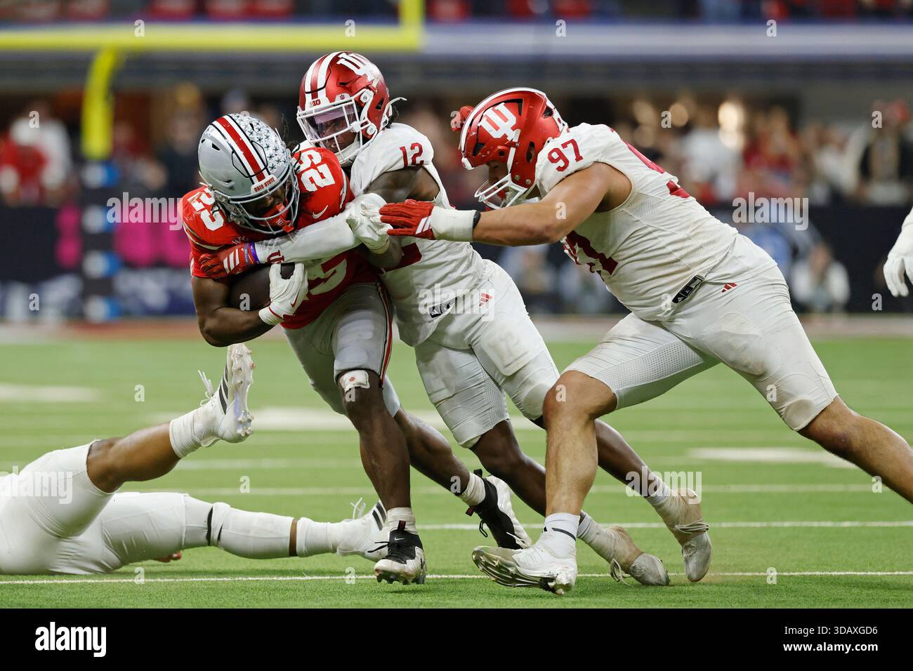 INDIANAPOLIS, IN - DECEMBER 06: Devan Boykin #12 and Mario Landino #97 ...