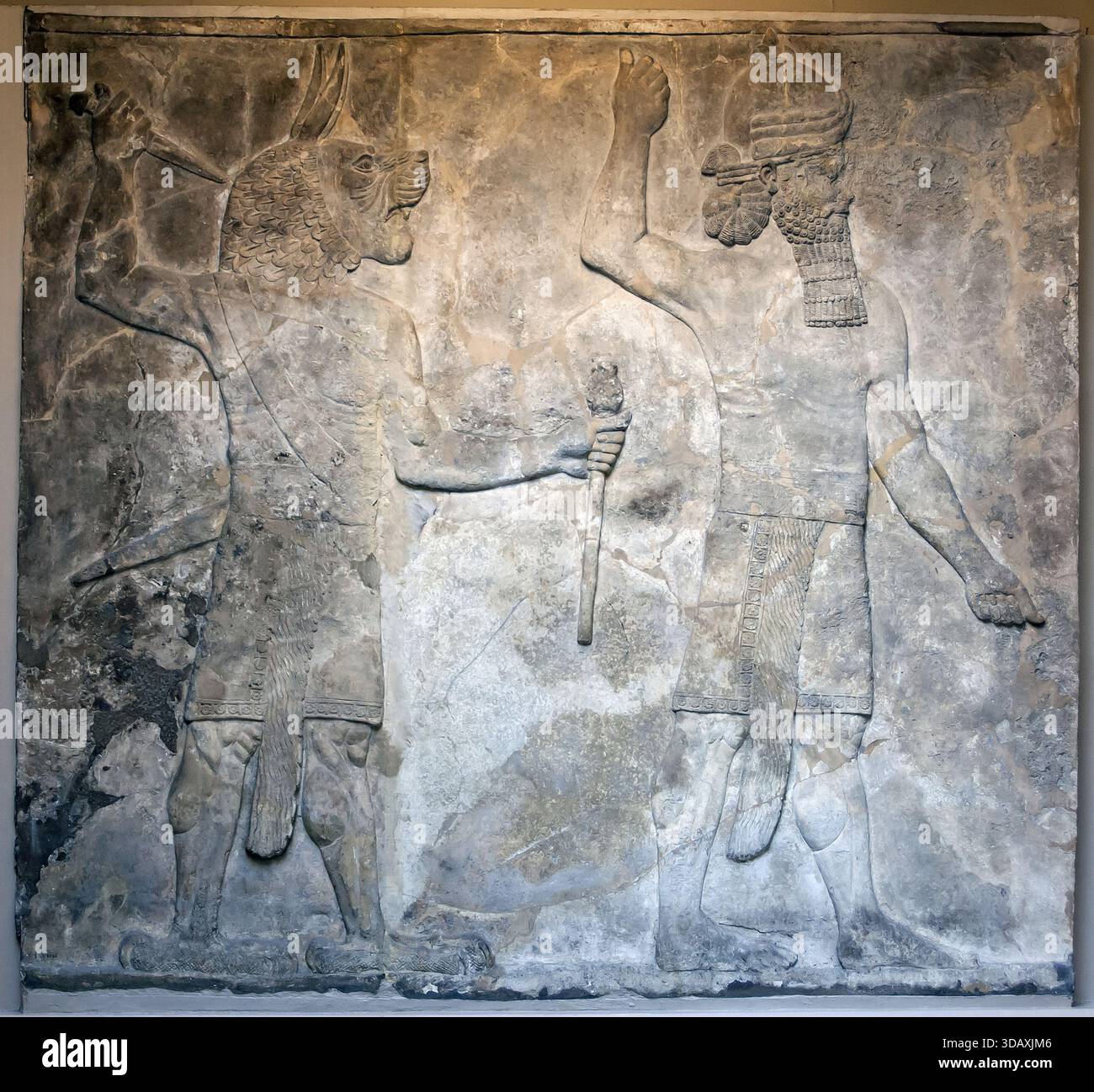 Assyrian panel, 704-681 BC, showing two palace guards: lion-headed ...