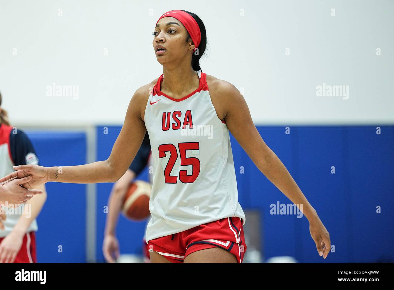 Angel Reese (25) takes part in drills during a training camp for the U ...