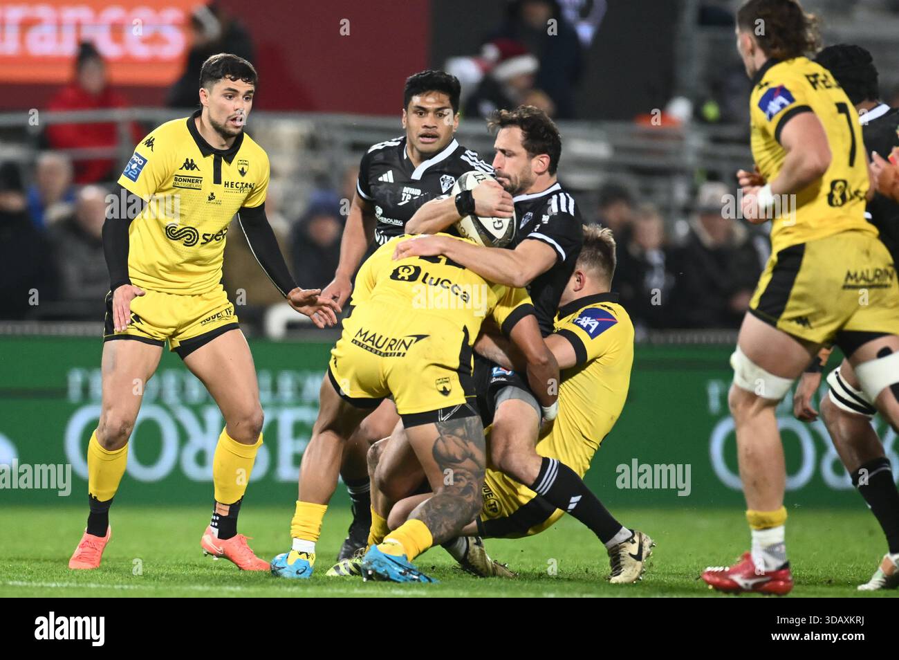 Julien Tisseron of Brive and Gabin Michet of Carcassonne and Ben Tapuai ...