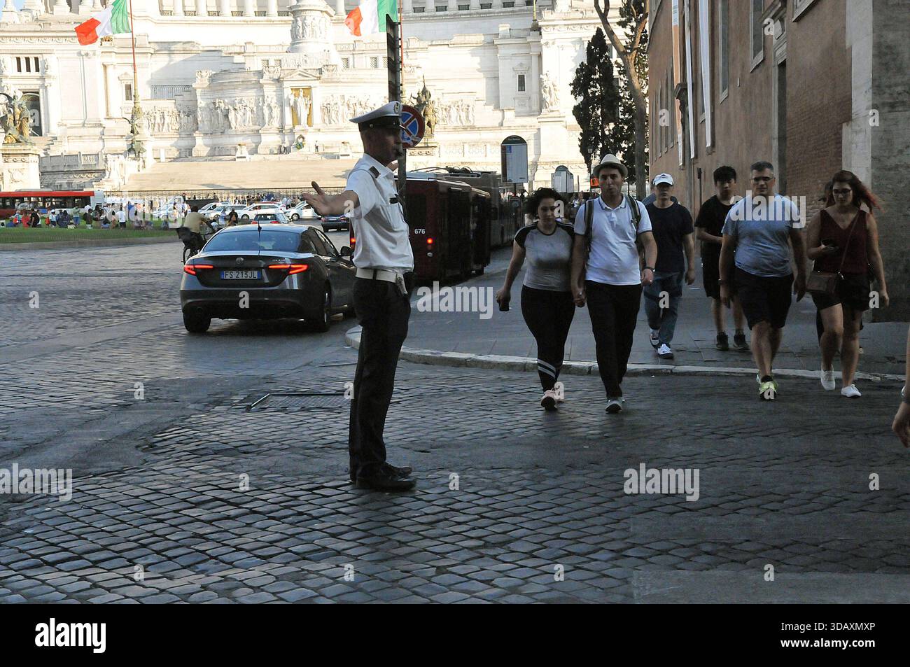 Rome / Italy 18.July 2019/ Police officer instructing traffic choas at ...