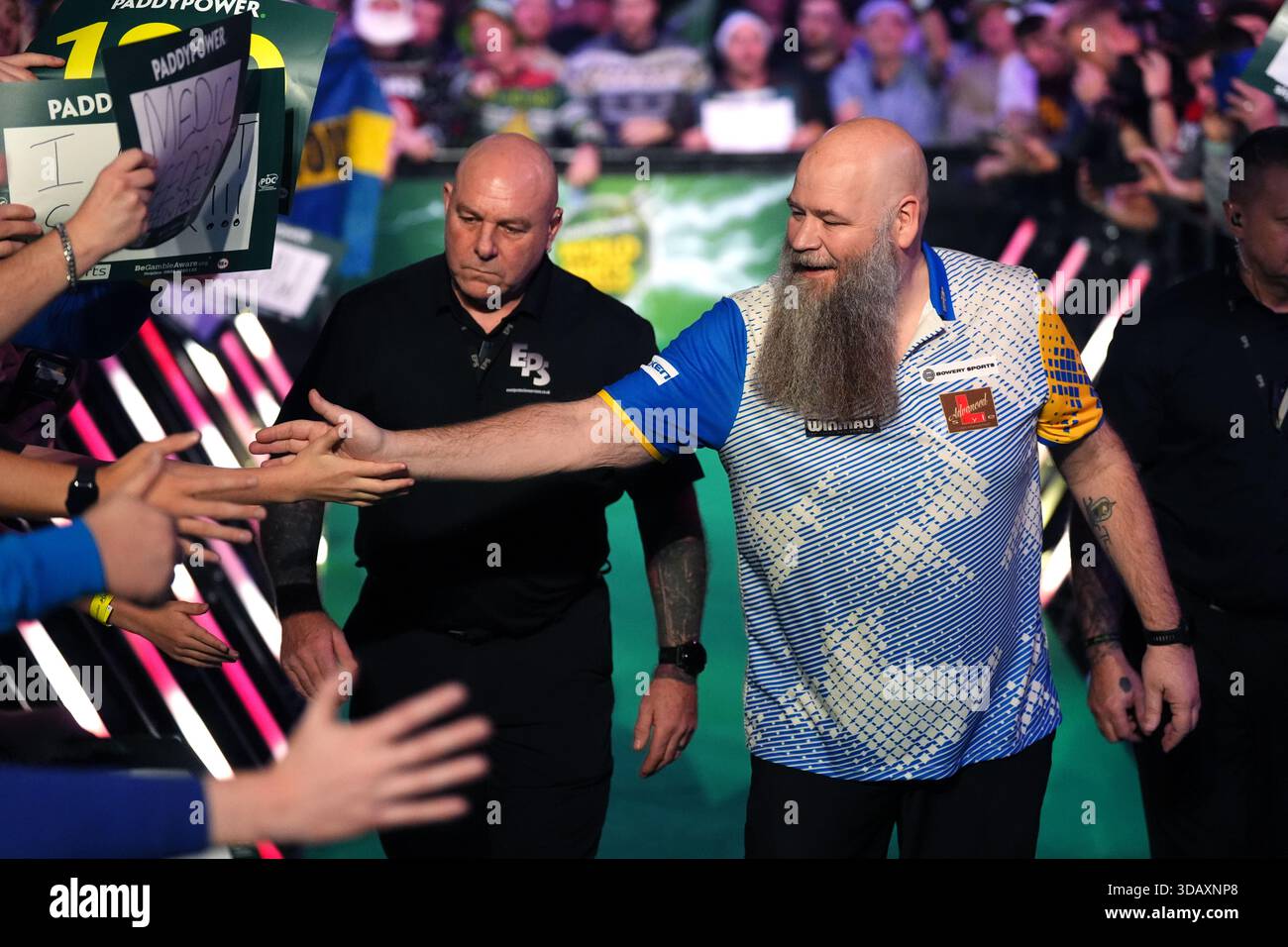 Andreas Harrysson walks to the oche on day two of the Paddy Power World ...
