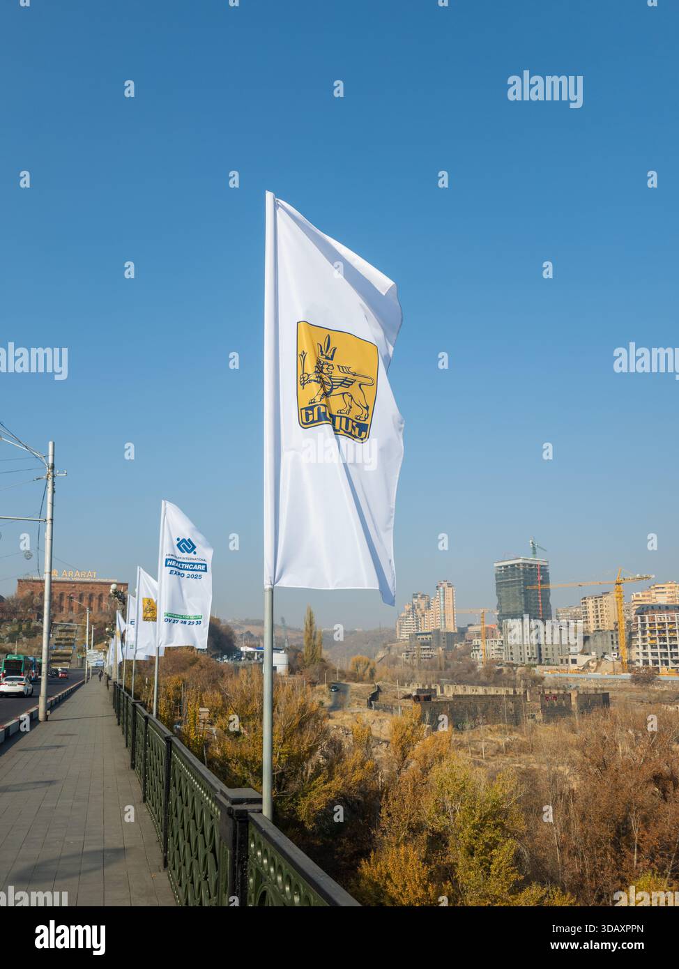 Yerevan Armenia 10.25.2025. A white flag with a yellow lion emblem is ...