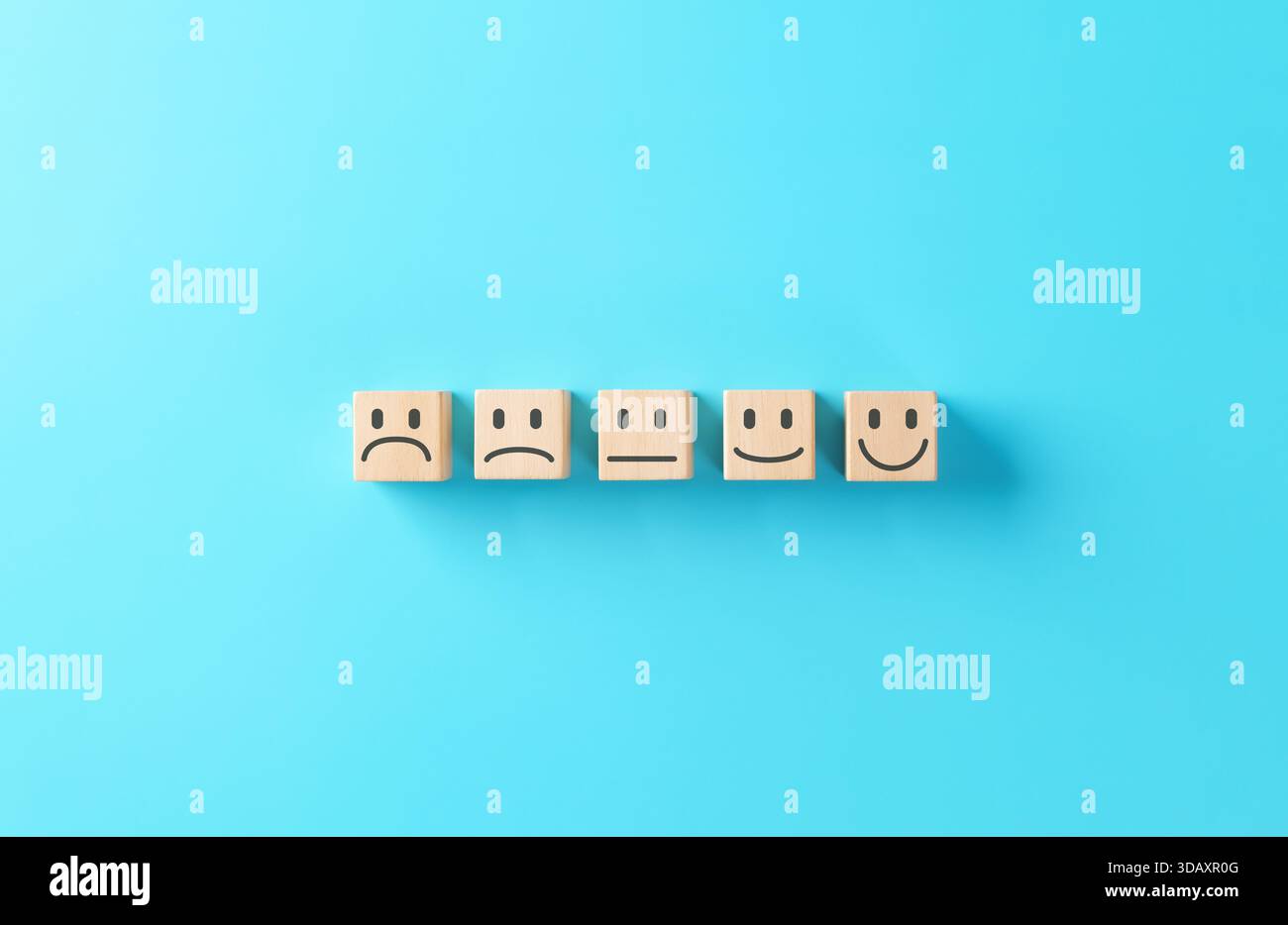 Customer satisfaction and feedback concept with wooden blocks ...