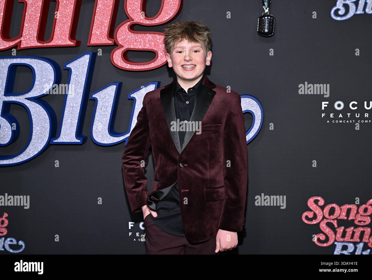 Hudson Hensley attends the premiere of "Song Sung Blue" at AMC Lincoln ...