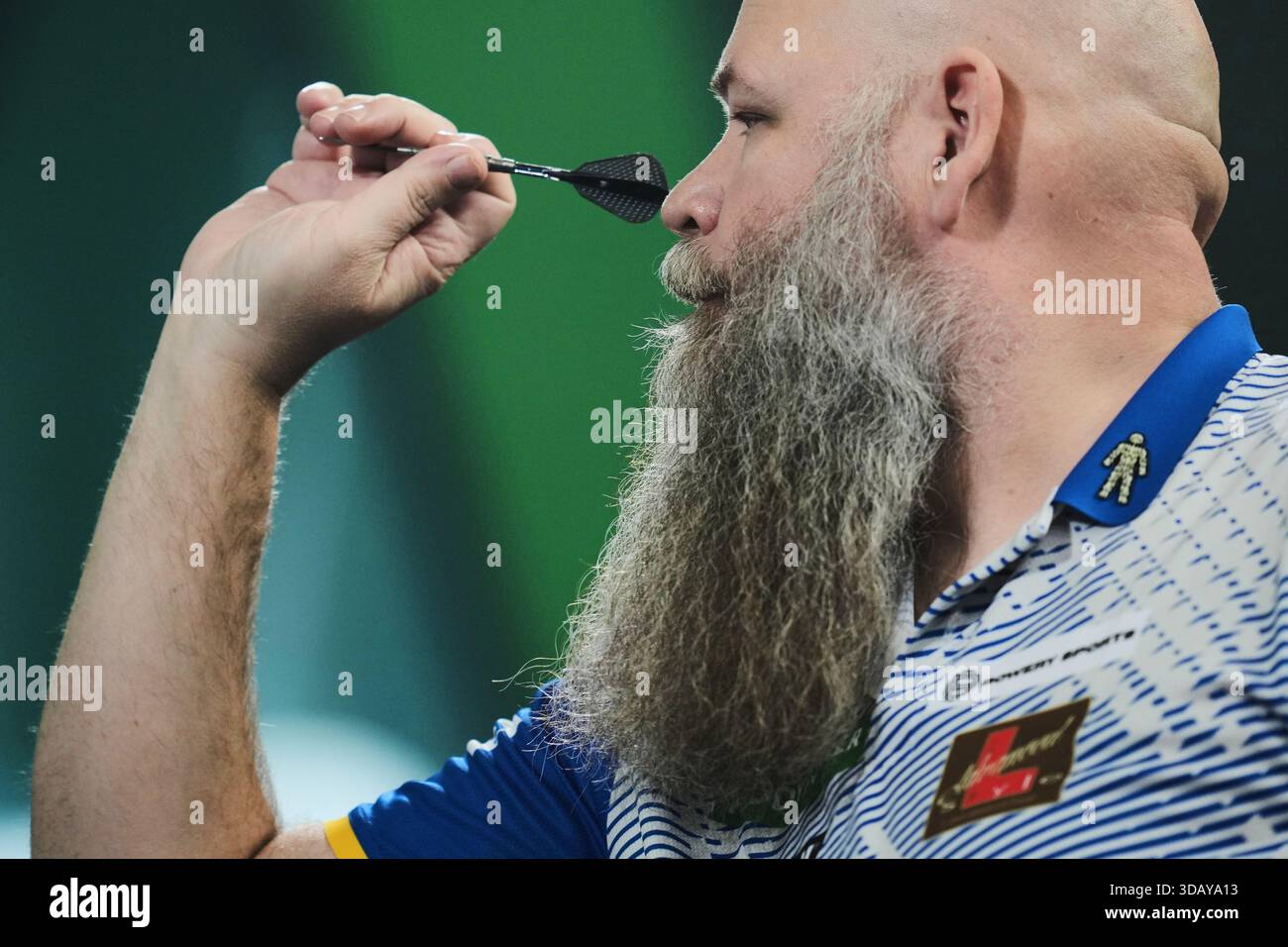 Andreas Harrysson of Sweden throws a dart during a round one match at ...