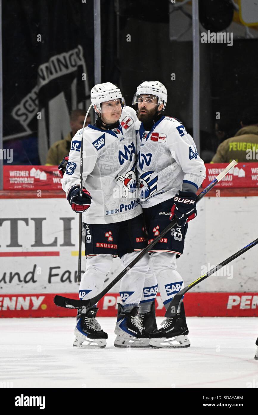 Celebration with (l.r.) Zach Solow (Adler Mannheim) Anthony Greco ...