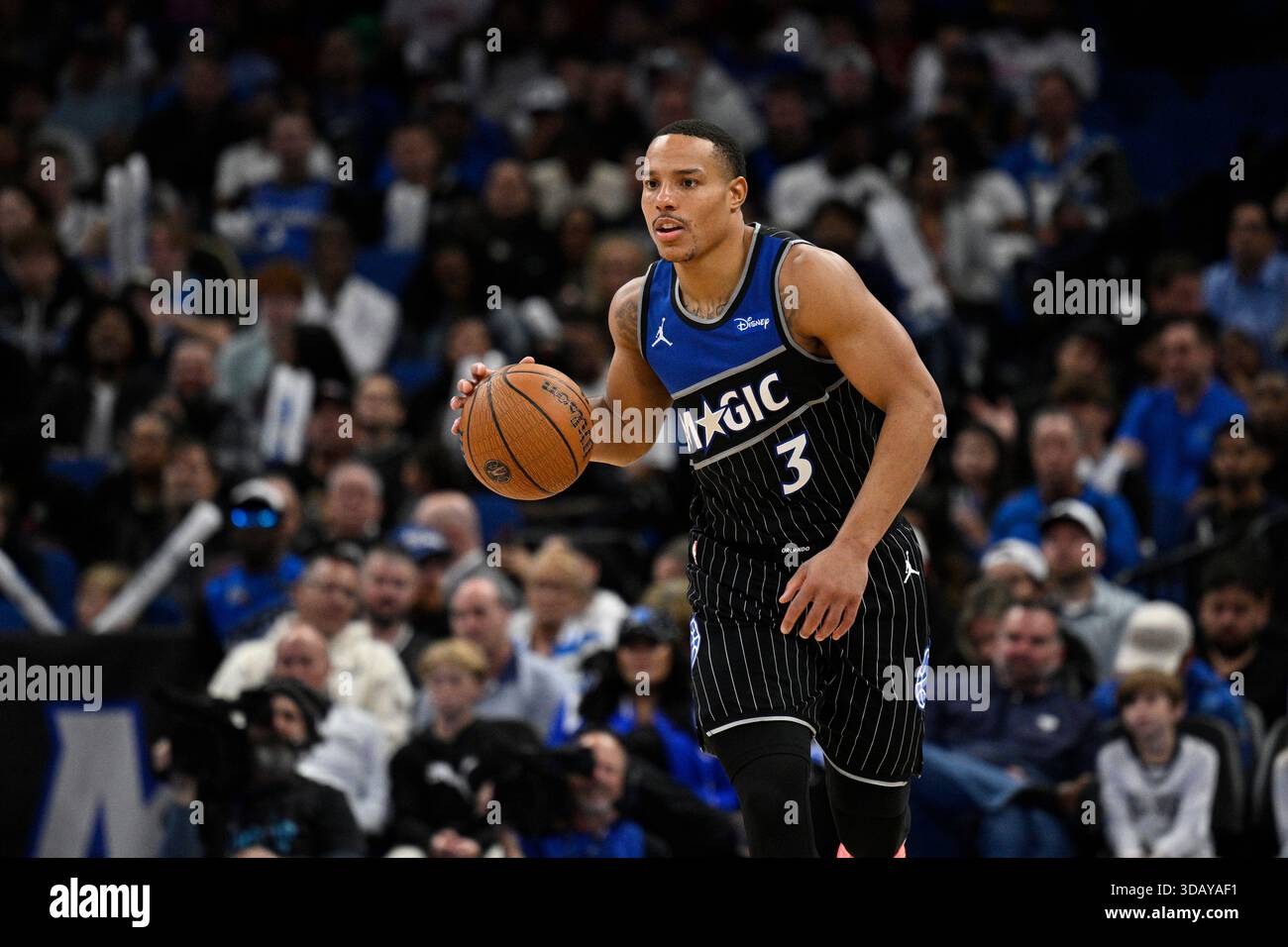 Orlando Magic guard Desmond Bane (3) brings the ball up the court ...