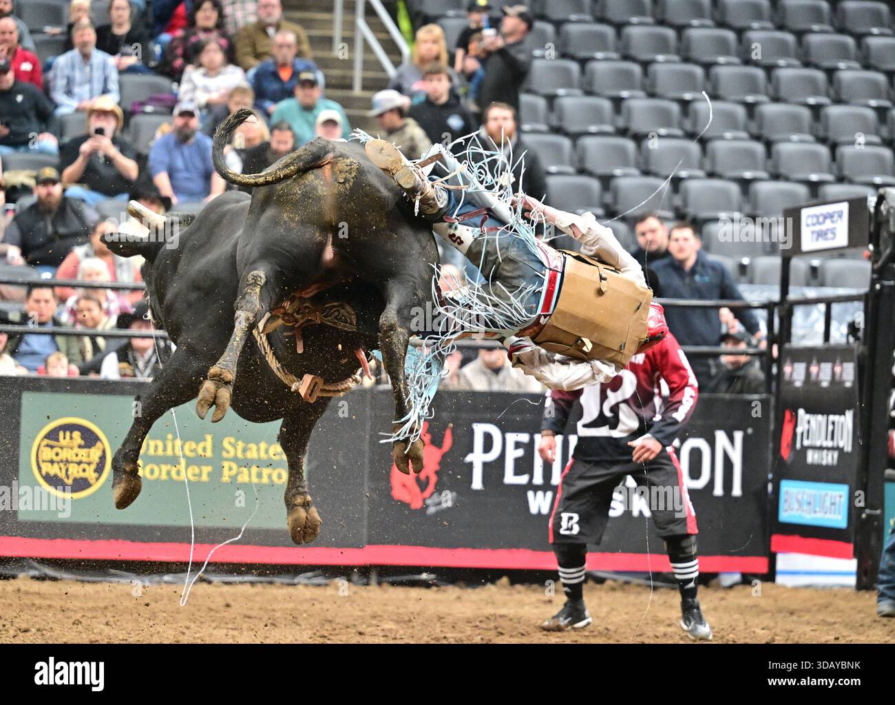 ST. LOUIS, MO - DECEMBER 07: Bullrider Dalton Rudman is thrown from the ...