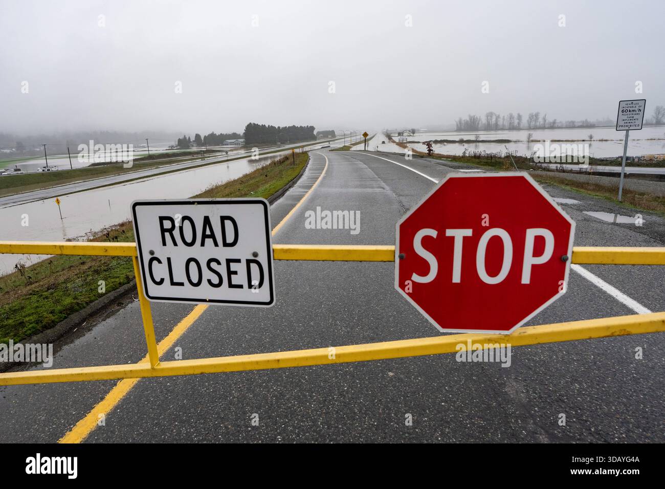 Abbotsford, Canada. 12th Dec, 2025. A gate blocks Highway 1 from ...