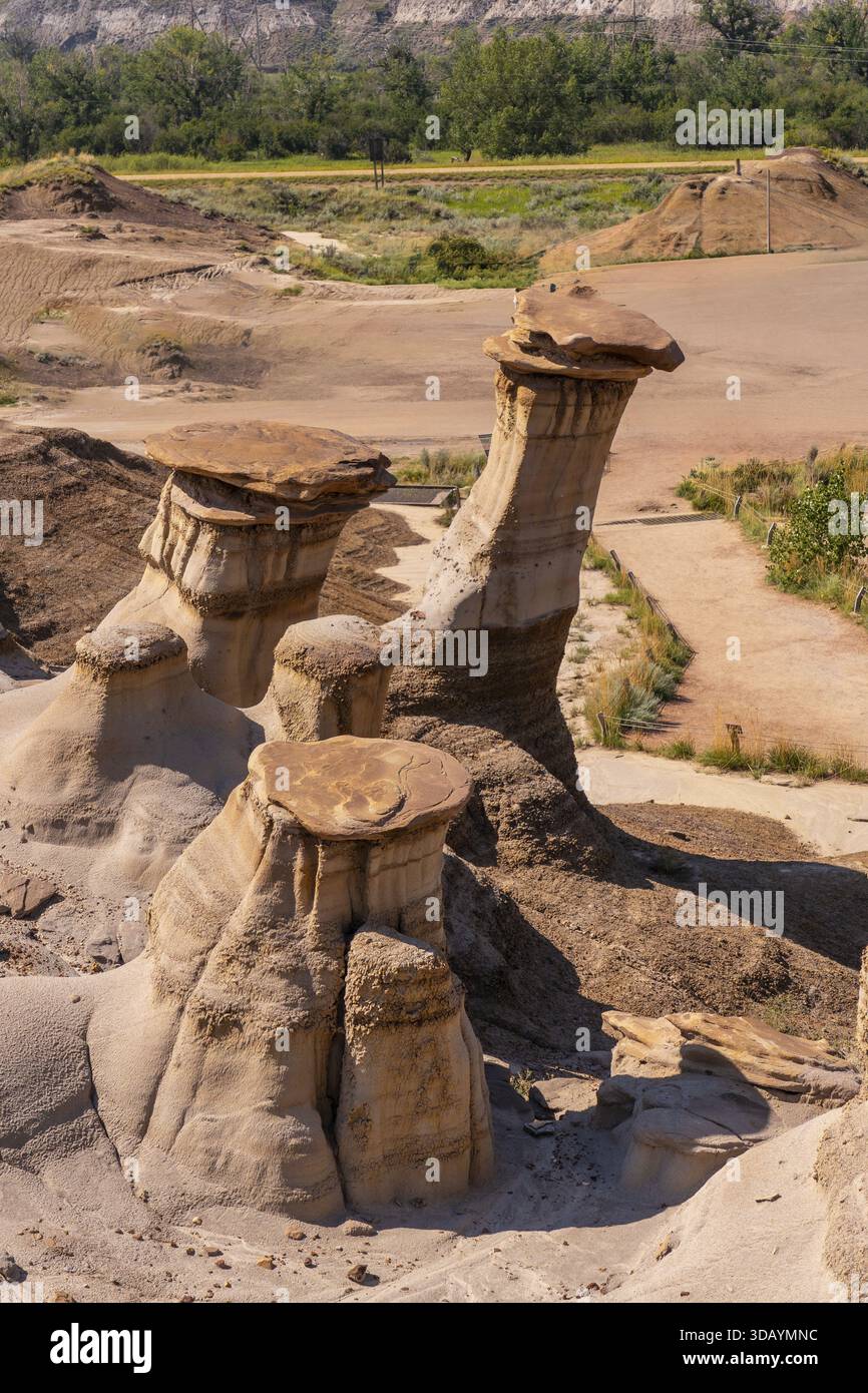 Unique hoodoo rock formations, sculpted by erosion, stand tall in the ...