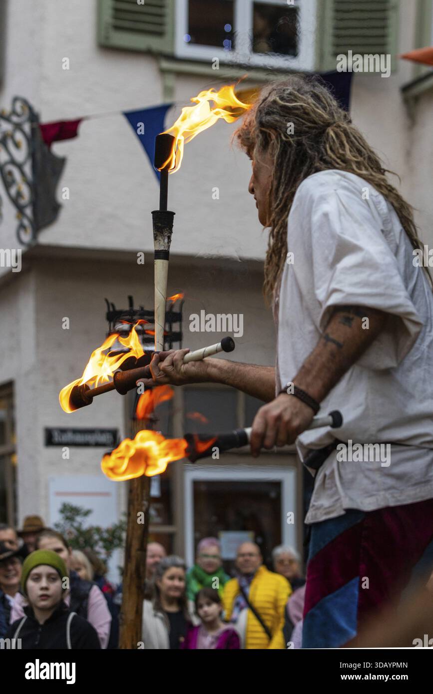 Juggler, fire, stage, audience, medieval clothing, medieval market ...