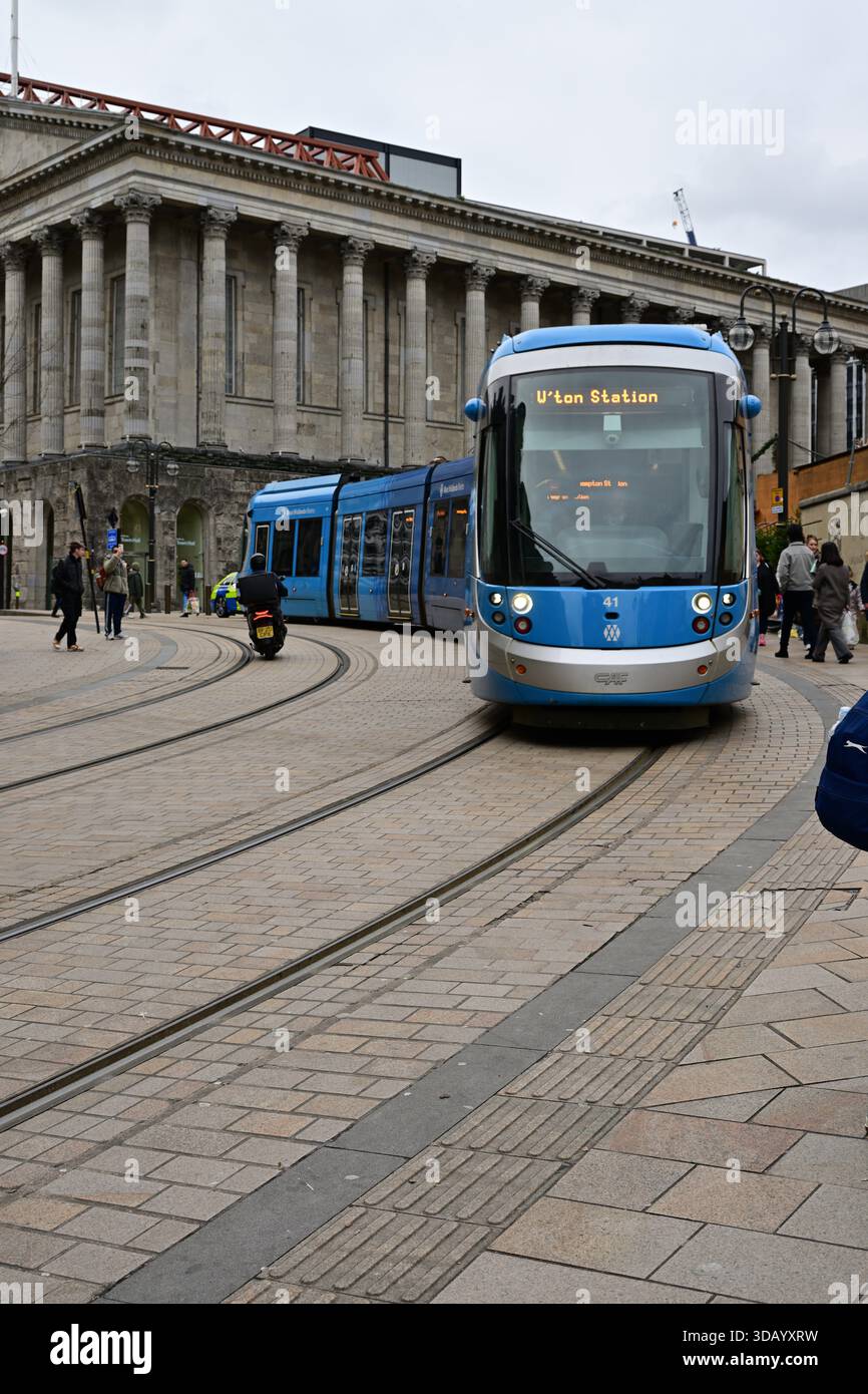 Tram approaching intersection with traffic lights hi-res stock ...