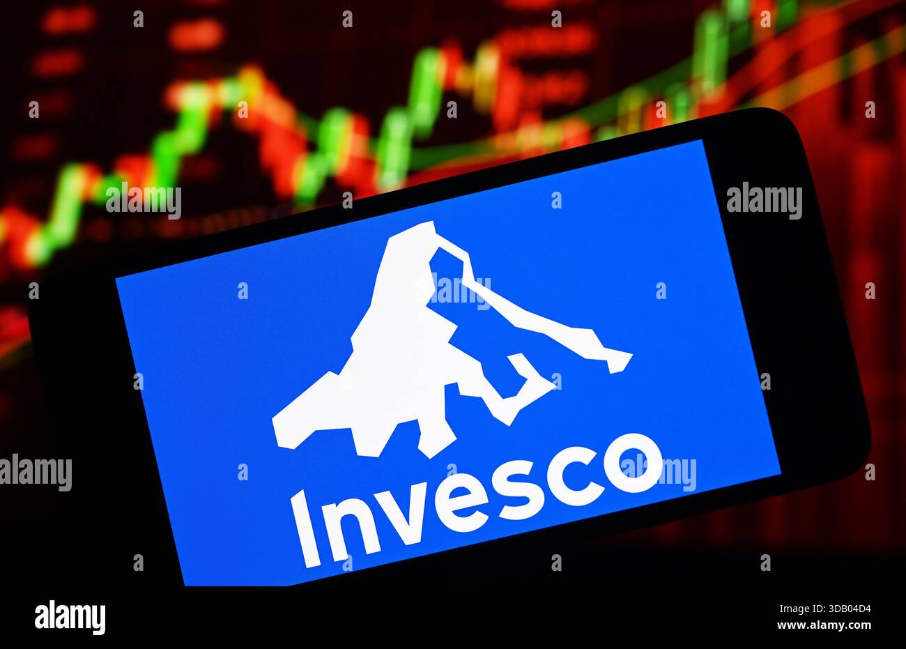 In this photo illustration, the Invesco logo is seen on a smartphone ...