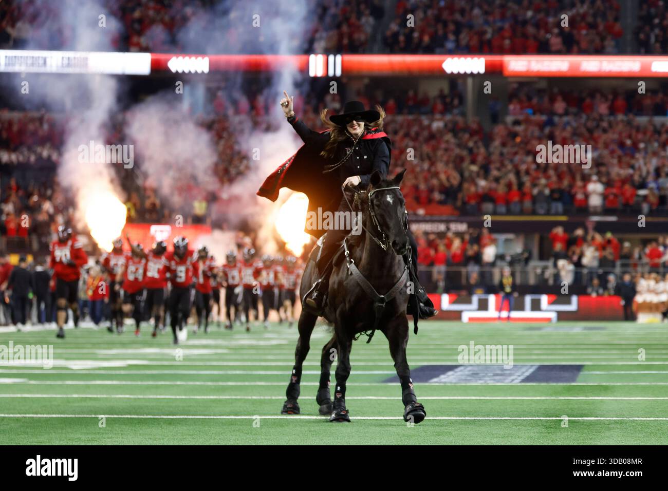Texas Tech University mascot, the masked rider, takes the field with ...