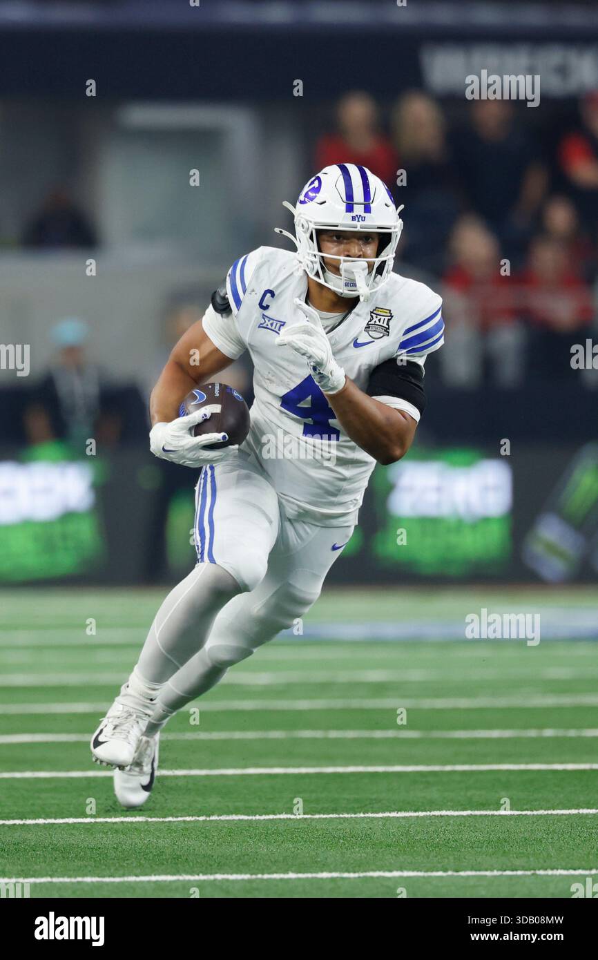 BYU running back LJ Martin (4) carries the ball during the NCAA Big 12 ...