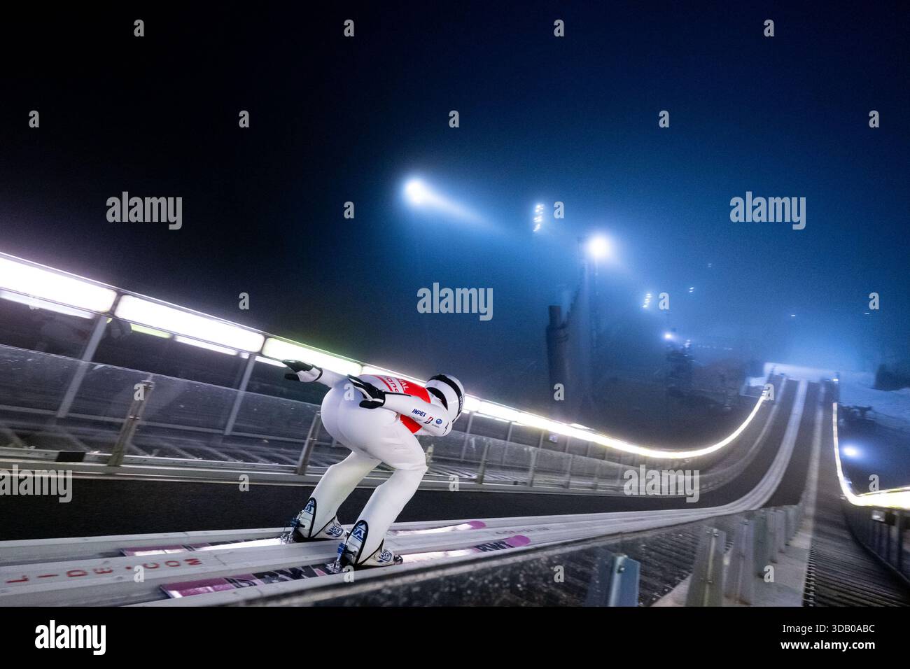 NAKAMURA Naoki (Japan), behind view over the inrun to the ski jump ...