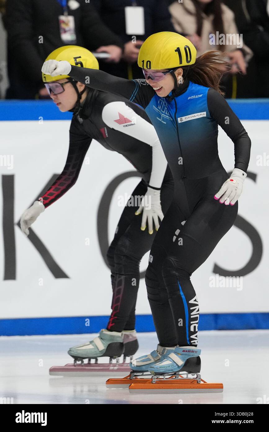 Haruna Nagamori of Japan (10) reacts after winning the women's 500 meters at the All Japan Short ...