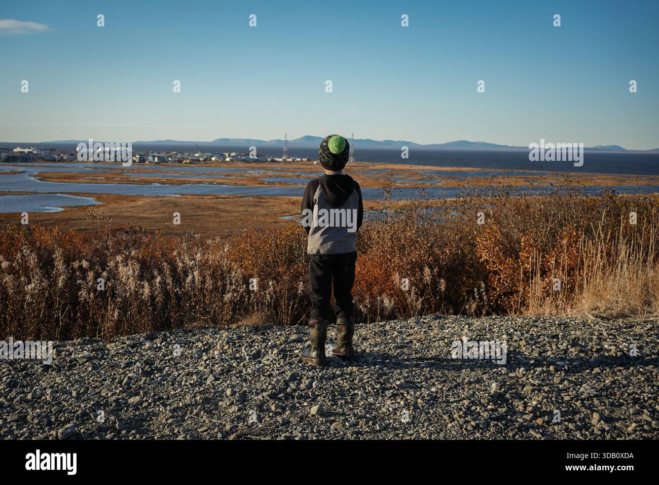 James Schaeffer, 7, looks out at a view of Kotzebue, Alaska, Friday ...