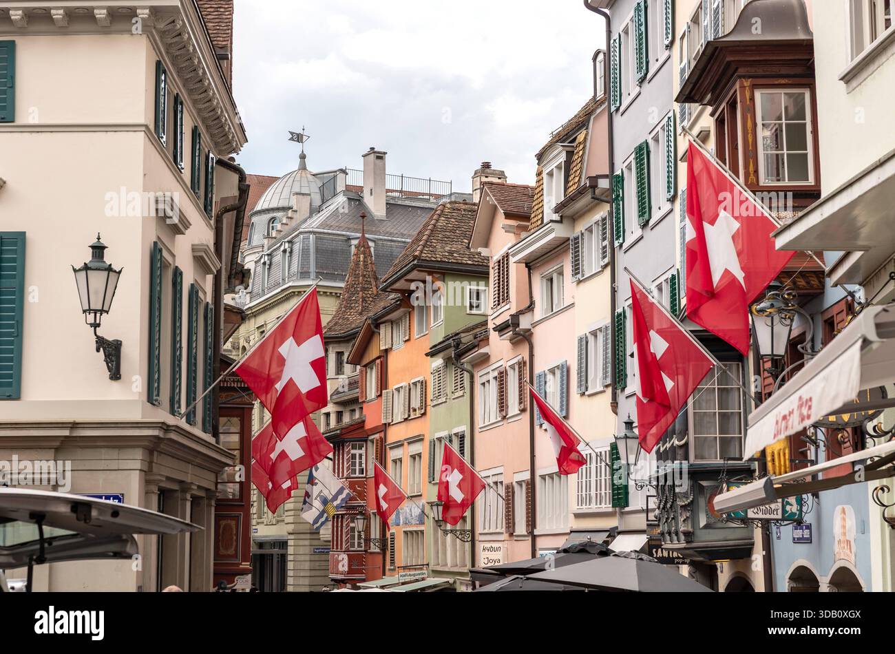 Streets of Zurich s old town decorated with Swiss flags. Zurich ...