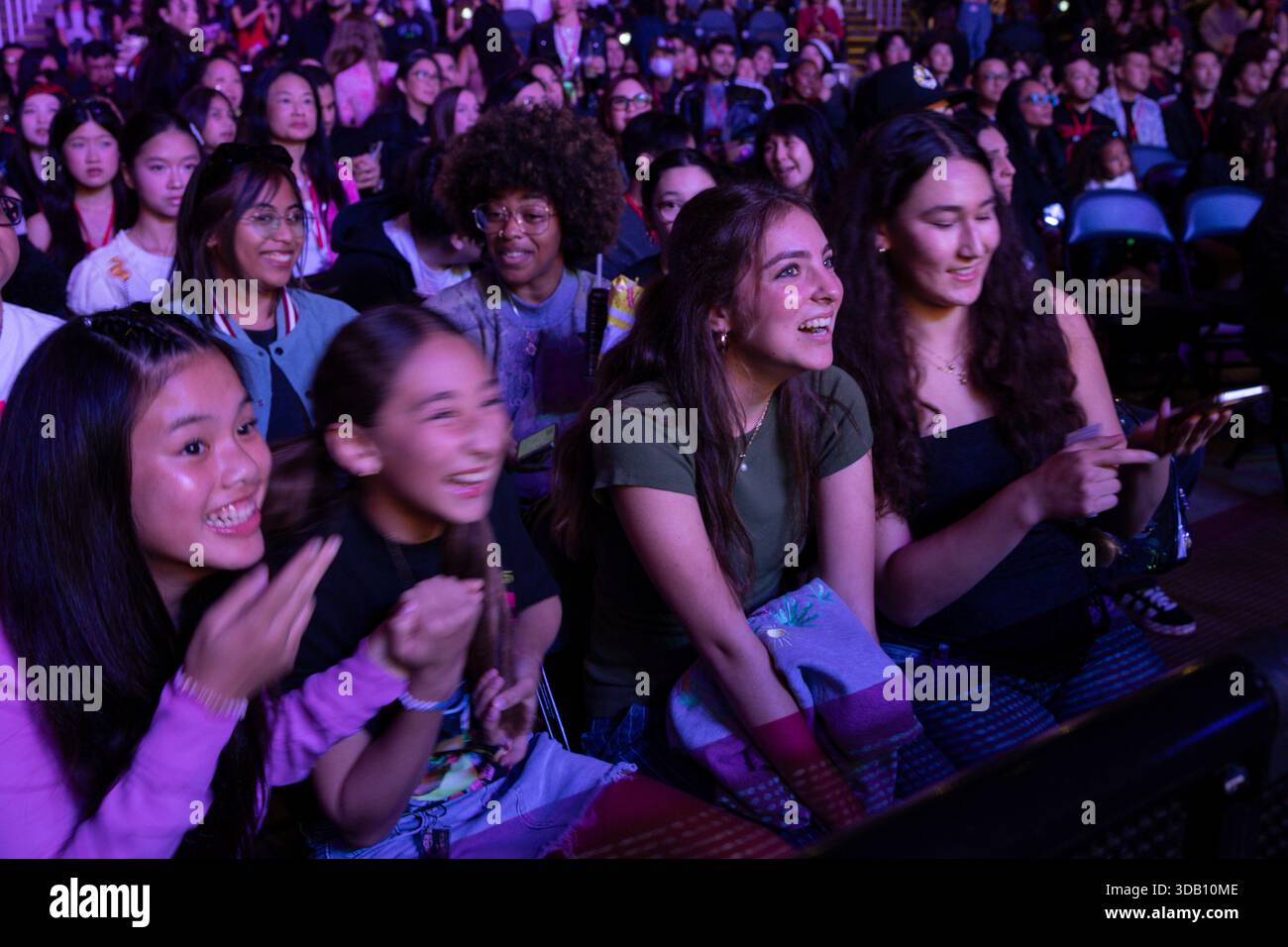 Concertgoers wait to watch the group KATSEYE perform on Friday, Dec. 12 ...