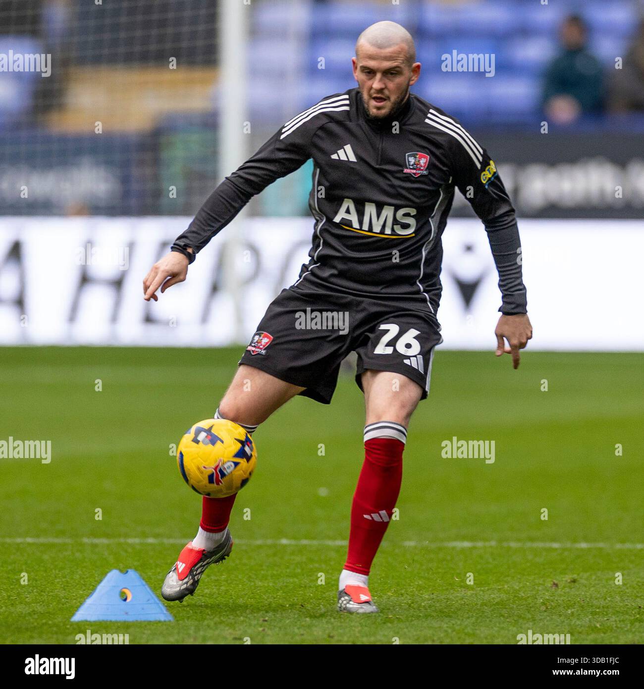 Pierce Sweeney #26 of Exeter City F.C. warms-up before the match during ...