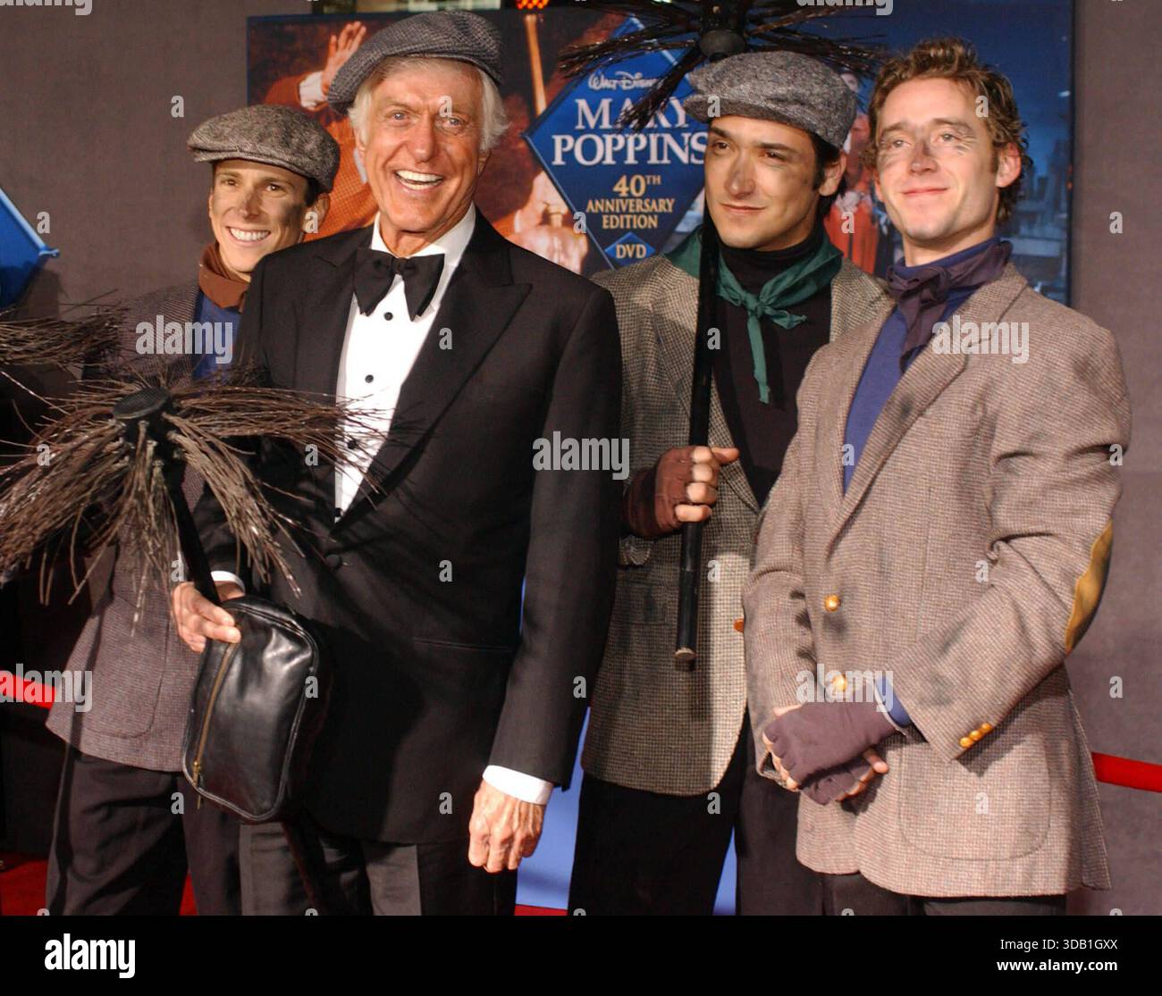 FILE - Dick Van Dyke poses with chimney sweeps during arrivals to the ...