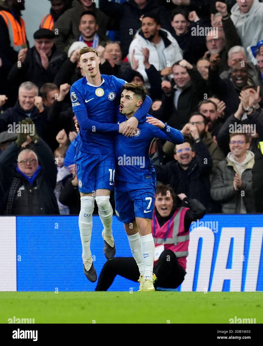 Chelsea's Cole Palmer (left) celebrates with Pedro Neto after scoring ...