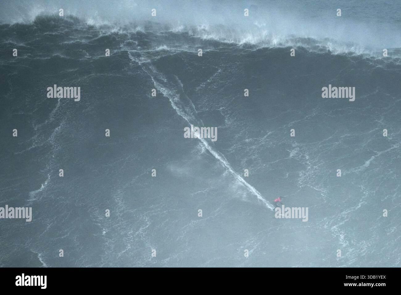 Surfer Lucas Chianca, from Brazil, drops down his first wave of the ...