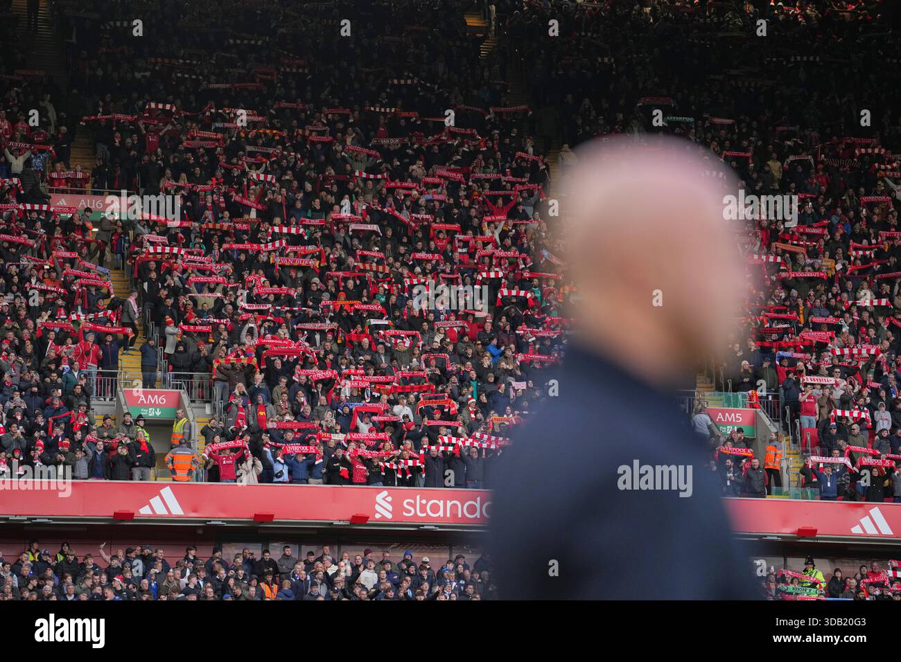 Liverpool fans cheer before the English Premier League soccer match ...
