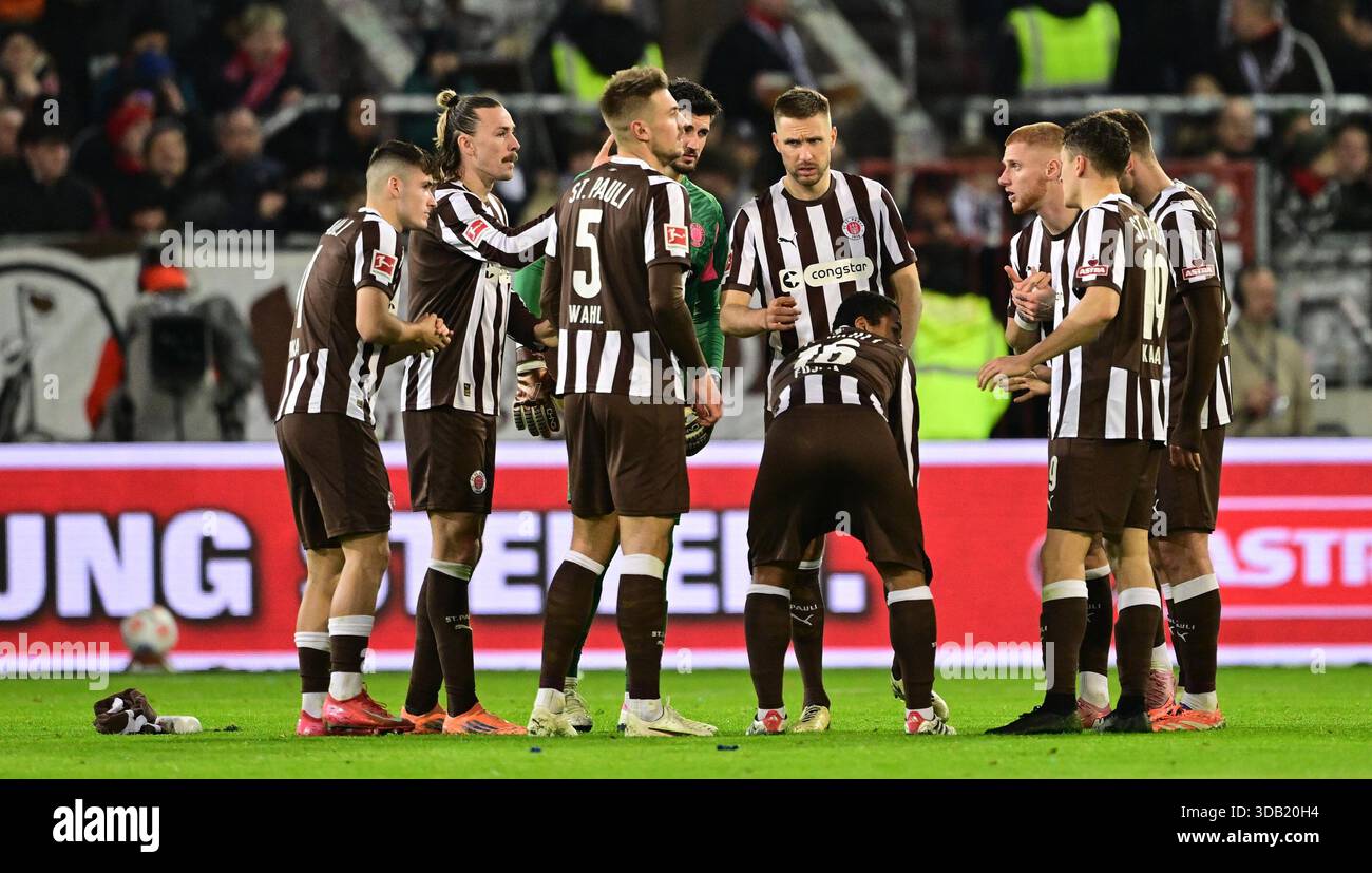 from left Arkadiusz Pyrka, Jackson Irvine, Hauke Wahl, goalkeeper ...