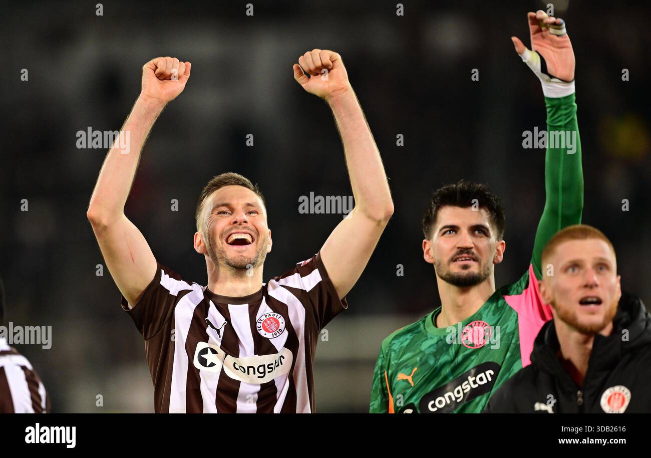 Final celebration from the left: Karol Mets, goalkeeper Nikola Vasilj ...