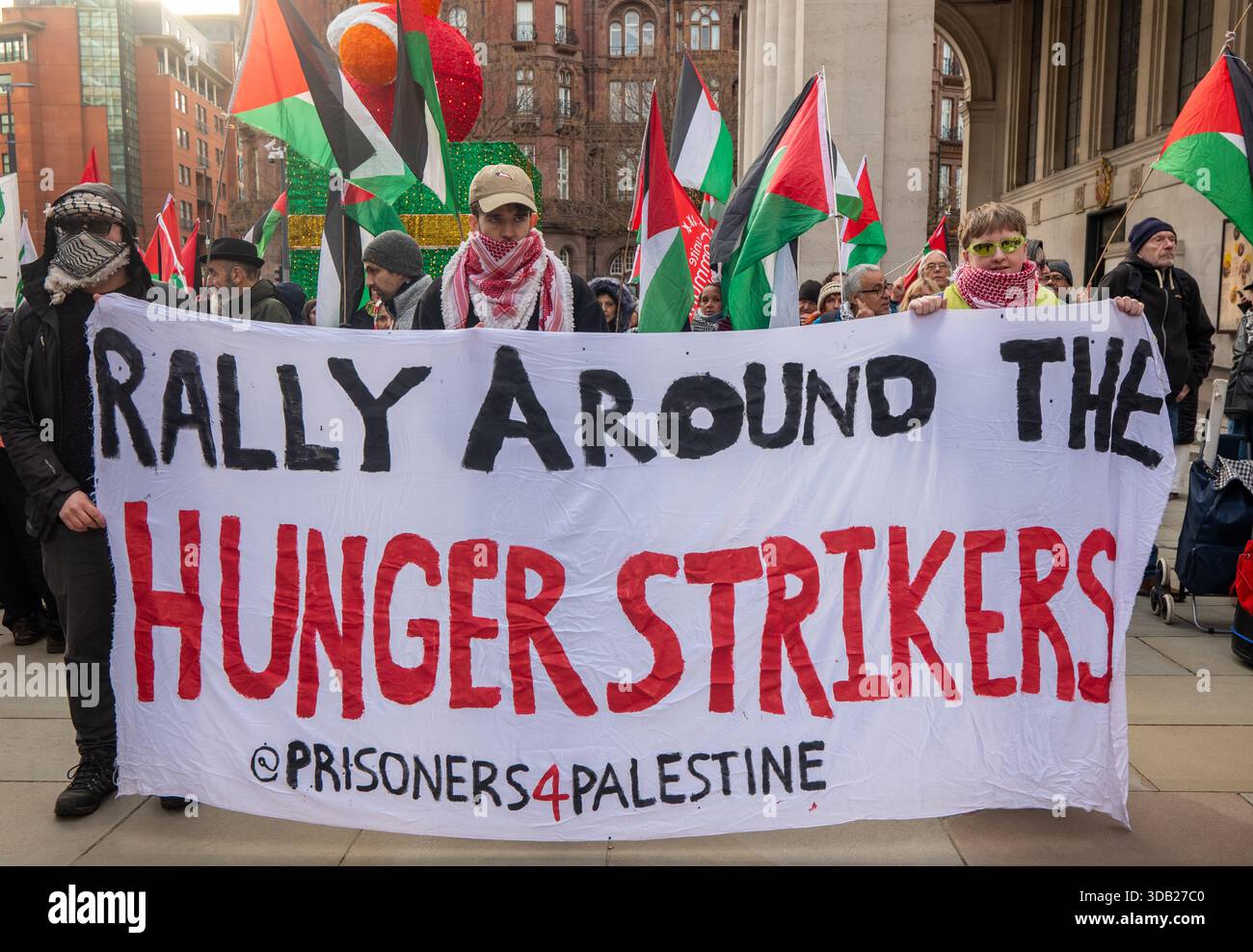 Signs supporting Palestine Action hunger strikers. Protest to ...