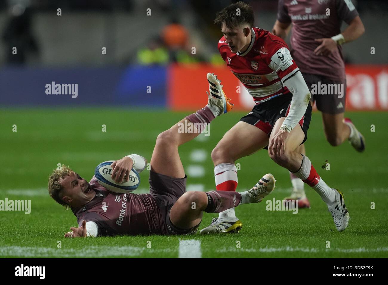 Munster Rugby's Craig Casey and Gloucester Rugby's Josh Hathaway (right ...