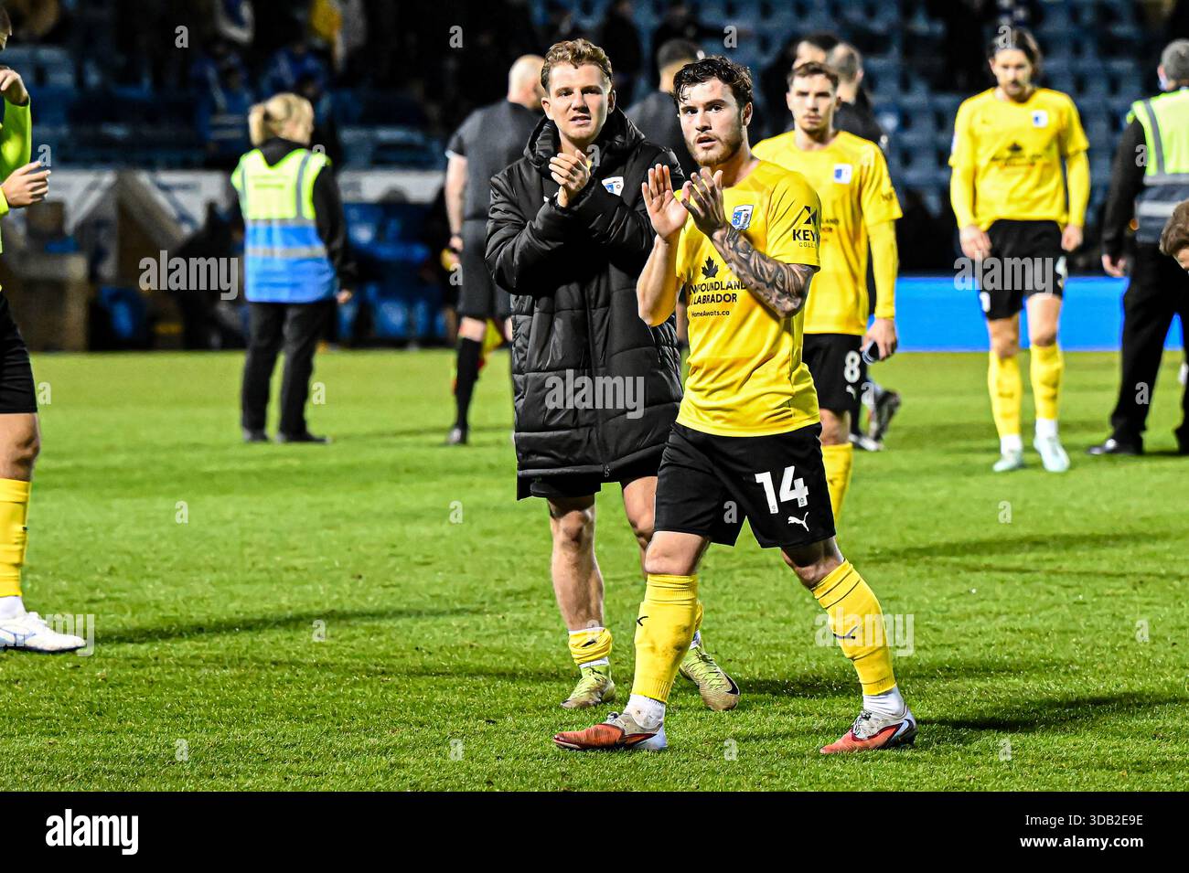 MJ Williams of Barrow AFC applauds fans after final whistle during the ...
