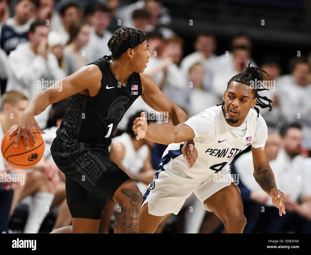 Penn State's Kayden Mingo (4) attempt to knock the ball away from ...