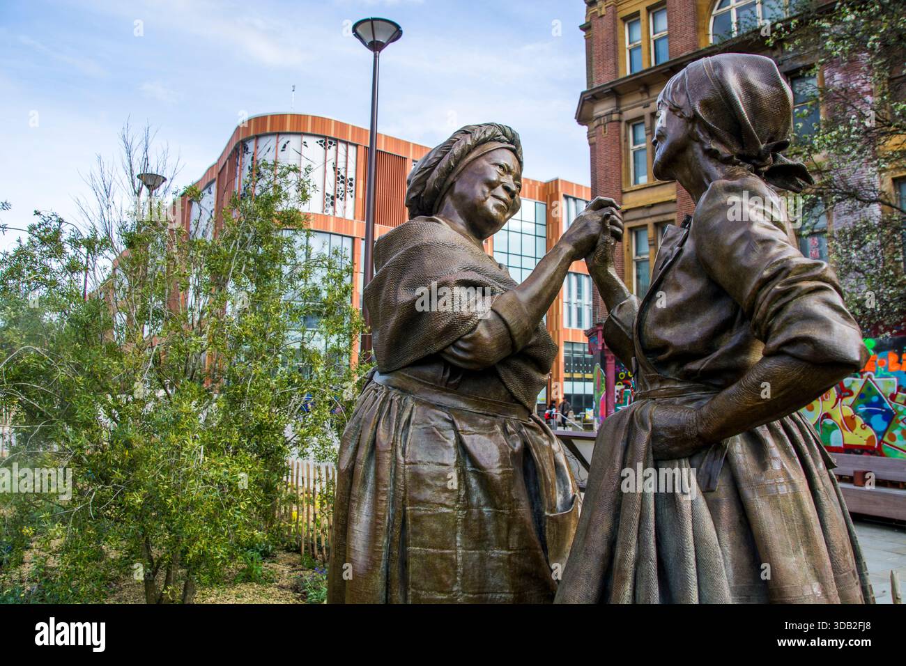 statue about the role of local women in the city’s textile trade ...