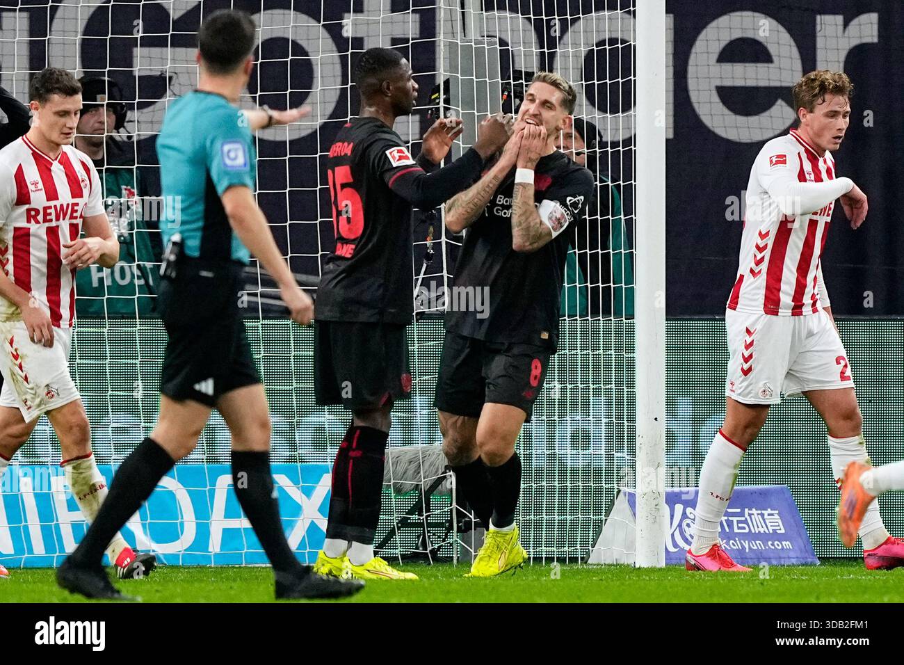 Leverkusen's Robert Andrich reacts after missing to scores during the ...