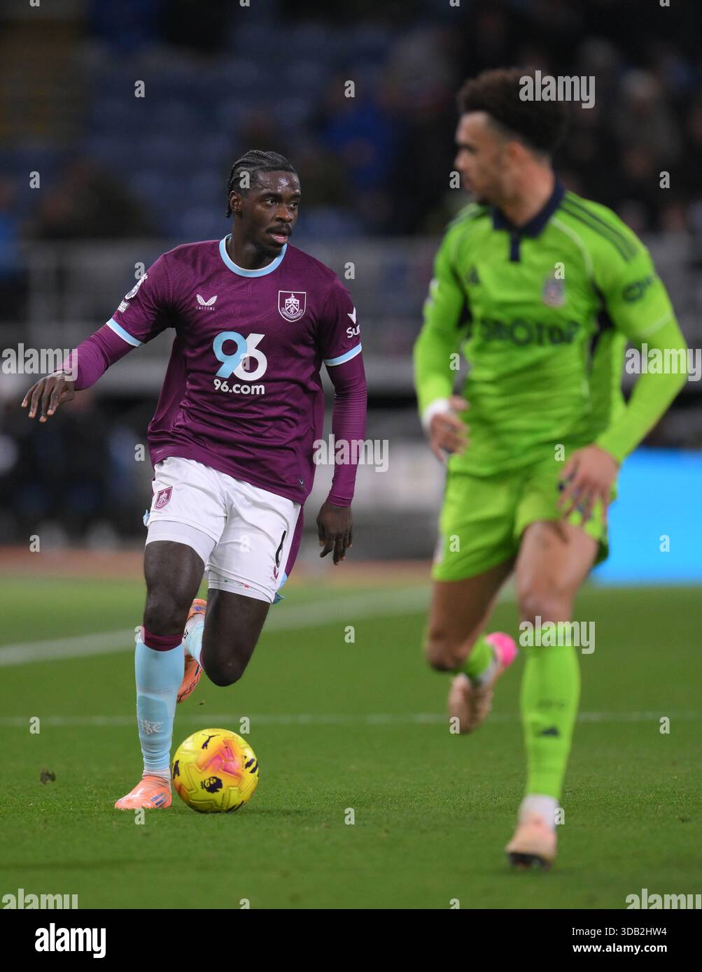 Burnley's Axel Tuanzebe (left) in action during the Premier League ...