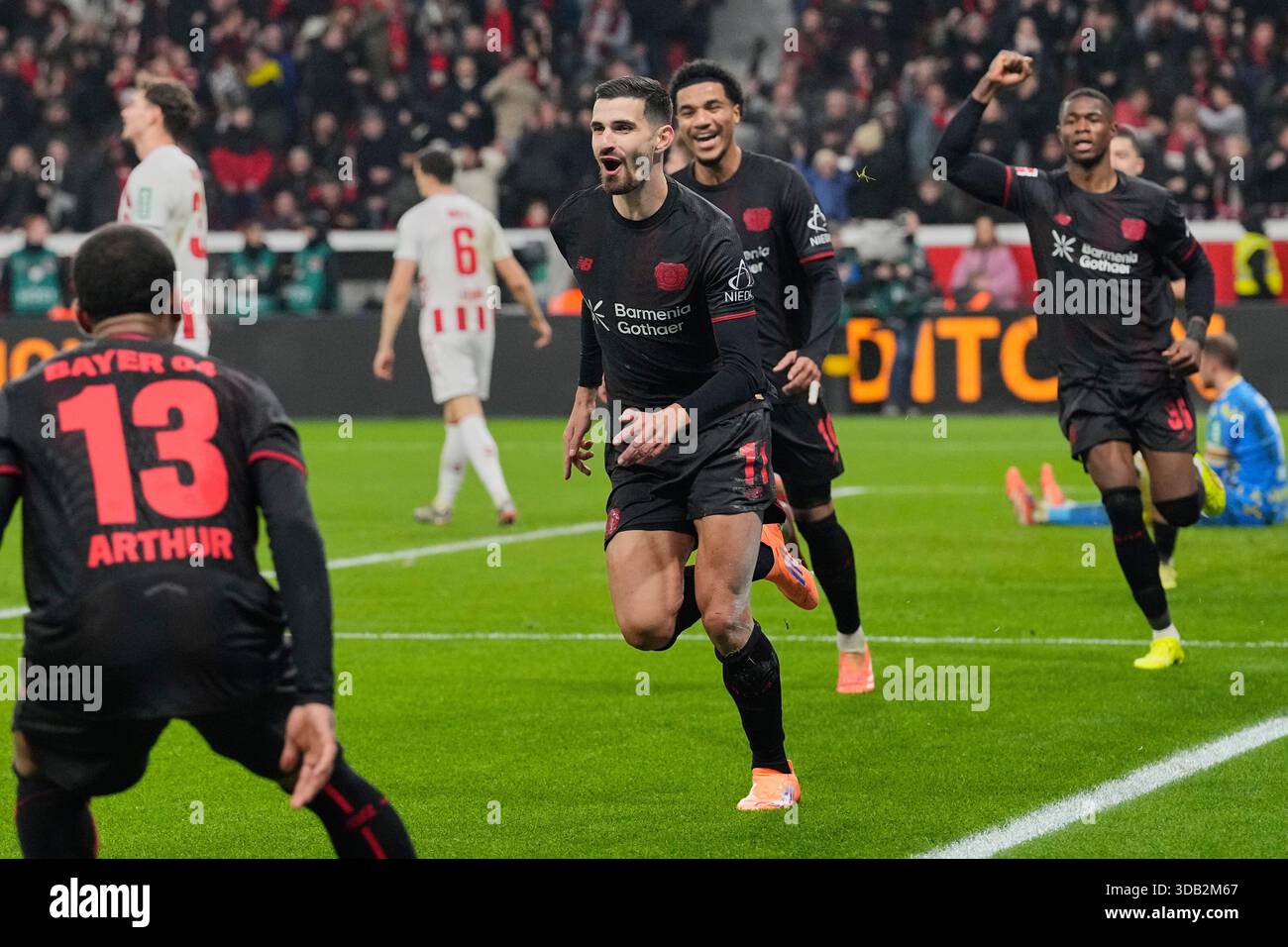 Leverkusen's Martim Terrier celebrates after he scored the opening goal ...