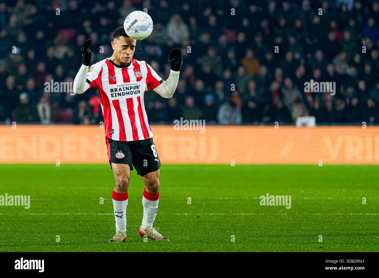 Sergino Dest of PSV Eindhoven heads the ball during the Dutch ...