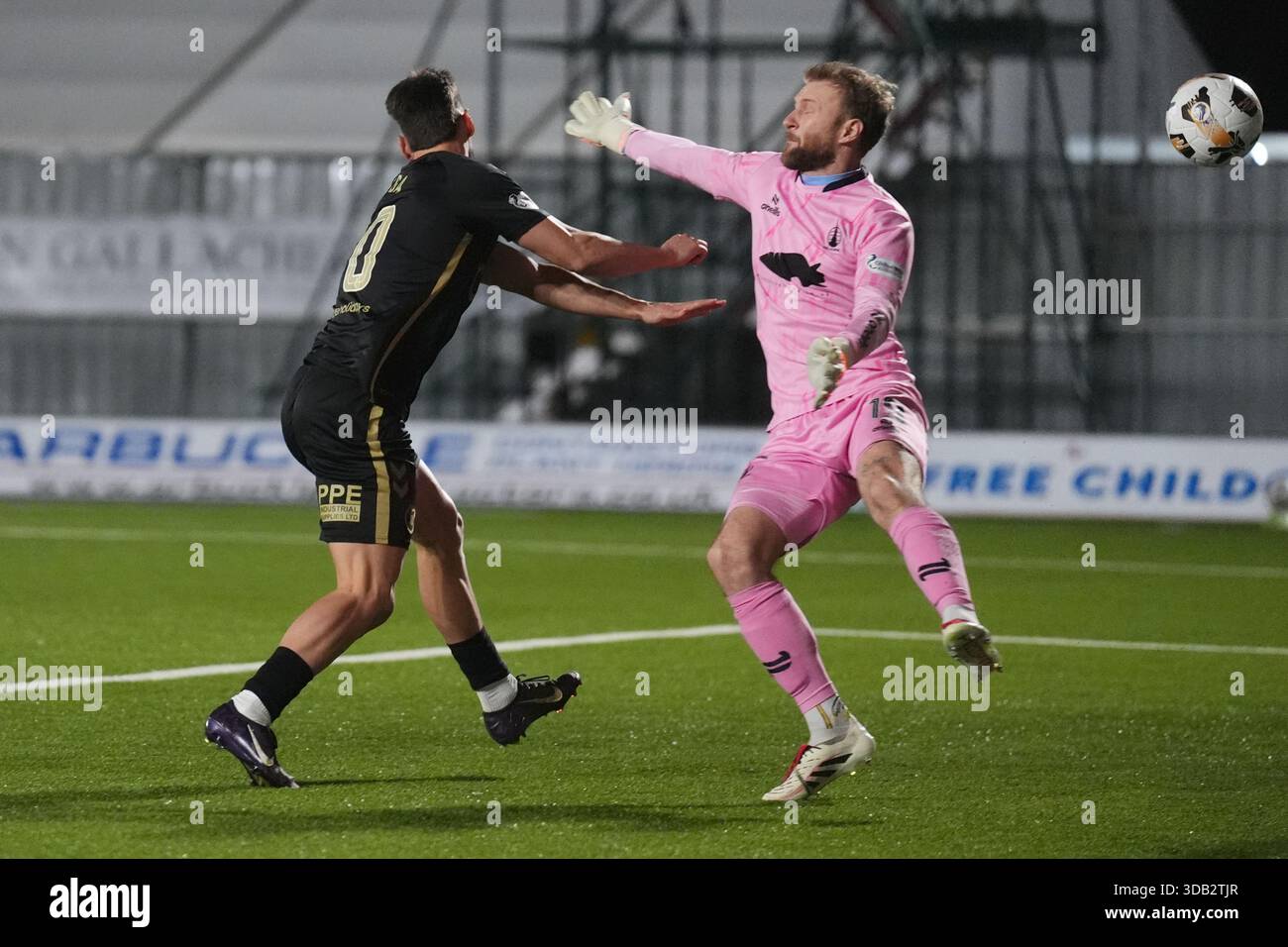 Heart of Midlothian's Claudio Braga (left) scores their side's first ...