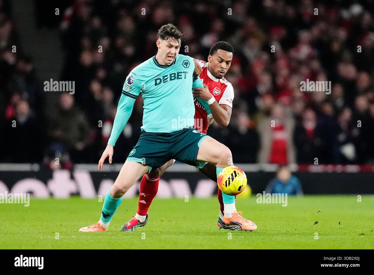 Wolverhampton Wanderers' Jorgen Strand Larsen (left) and Arsenal's ...