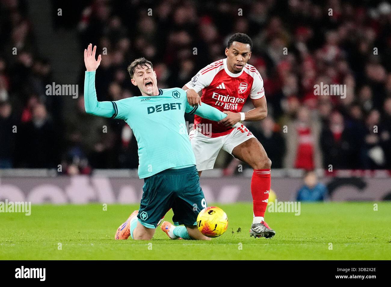 Wolverhampton Wanderers' Jorgen Strand Larsen (left) and Arsenal's ...