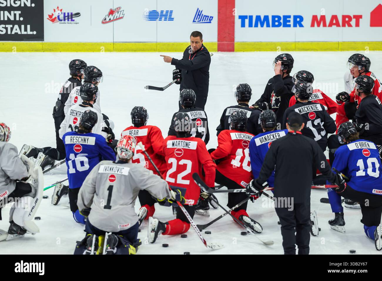 Team Canada coach Misha Donskov gives instruction during Canada's ...