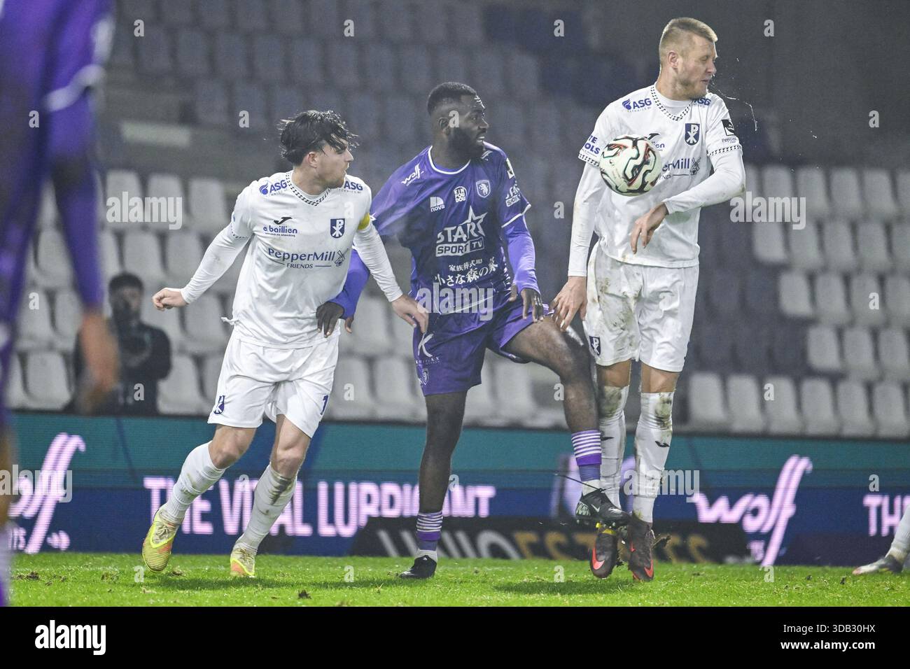 Patro Eisden's Jordan Renson, Beerschot's Arnold Vula and Patro Eisden ...